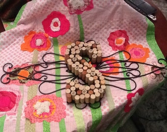 wrought iron decor with letter "S" wooden cork letter attached. Can be ...