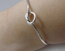 Popular items for love knot bracelet on Etsy