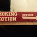 No smoking sign. Smoking section outside Rustic smoking