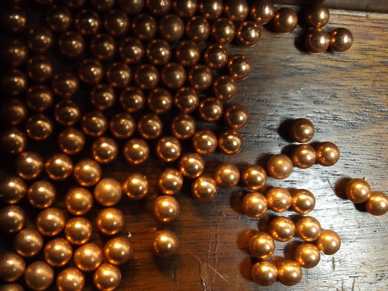 Metal small balls 4.38 mm the diameter.Copper plated. Project