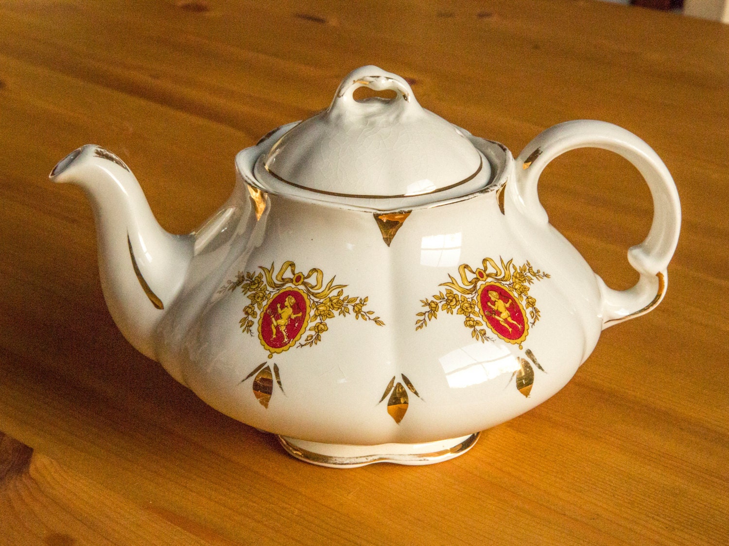 Handsome Edwardian teapot with Regency style cherubs and gilding ...