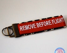 Popular items for remove before flight on Etsy