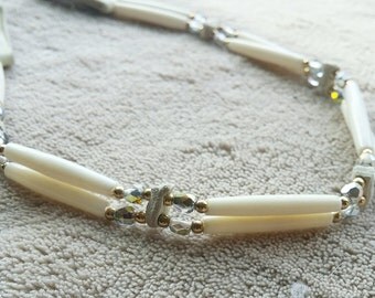 Items similar to Handmade Bone Bolo BEAVER on Black Cord Bone Tips on Etsy