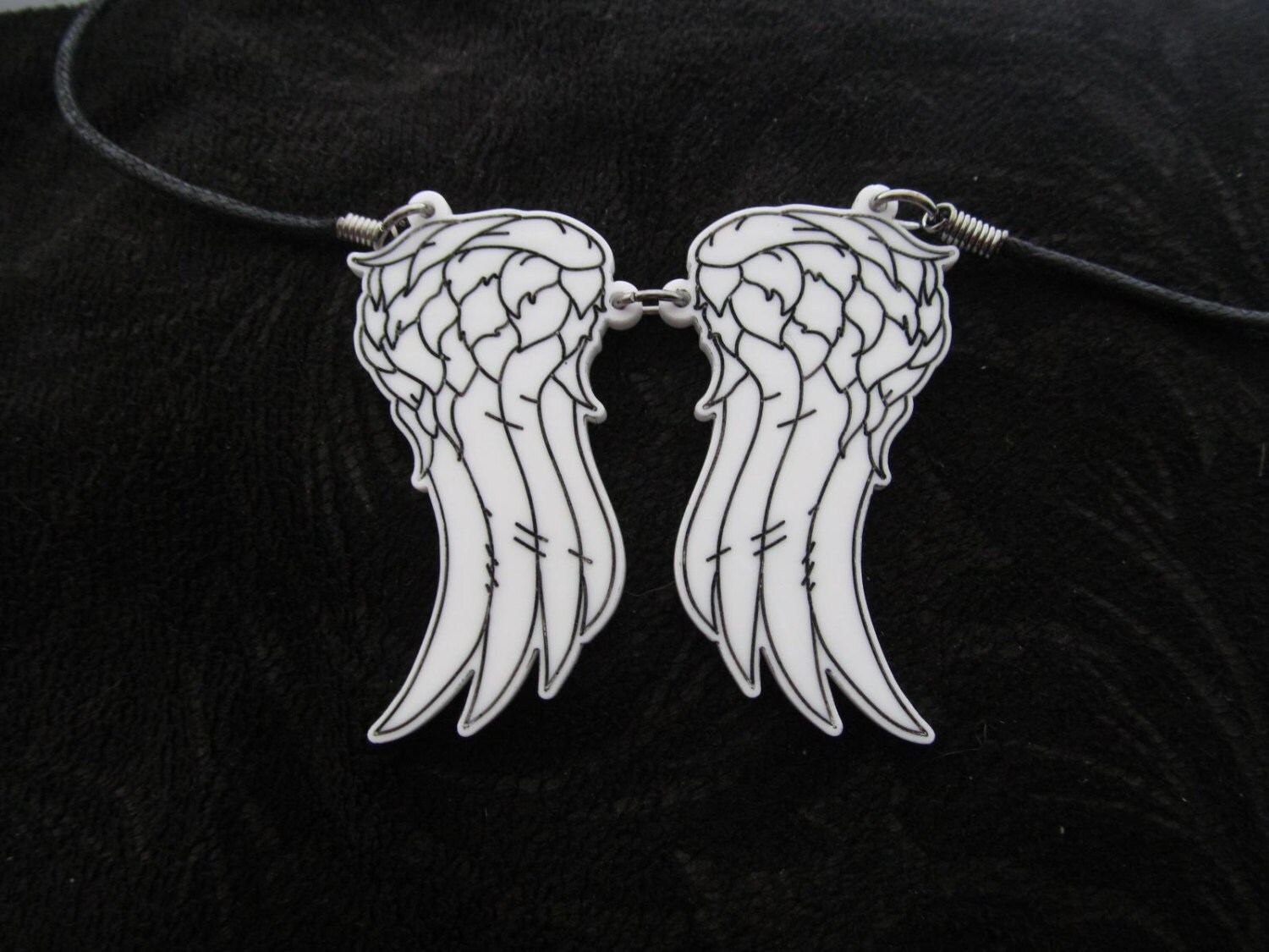 Laser cut/engraved Daryl Dixon angel wing necklace Walking