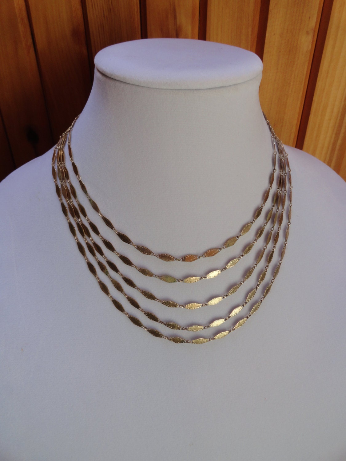 Goldtone Multi Strand Chain link Necklace – Haute Juice