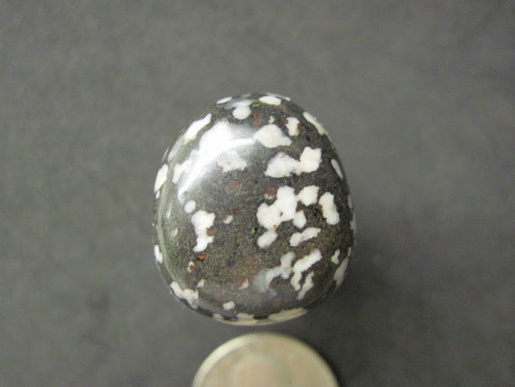 Items similar to Unknown black and white spotted stone freeform ...