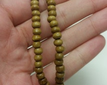 Popular items for olive wood beads on Etsy