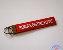 Popular items for remove before flight on Etsy