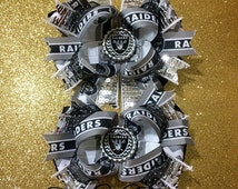 Popular items for raiders bow on Etsy