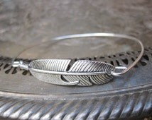 Popular items for feather bangle on Etsy