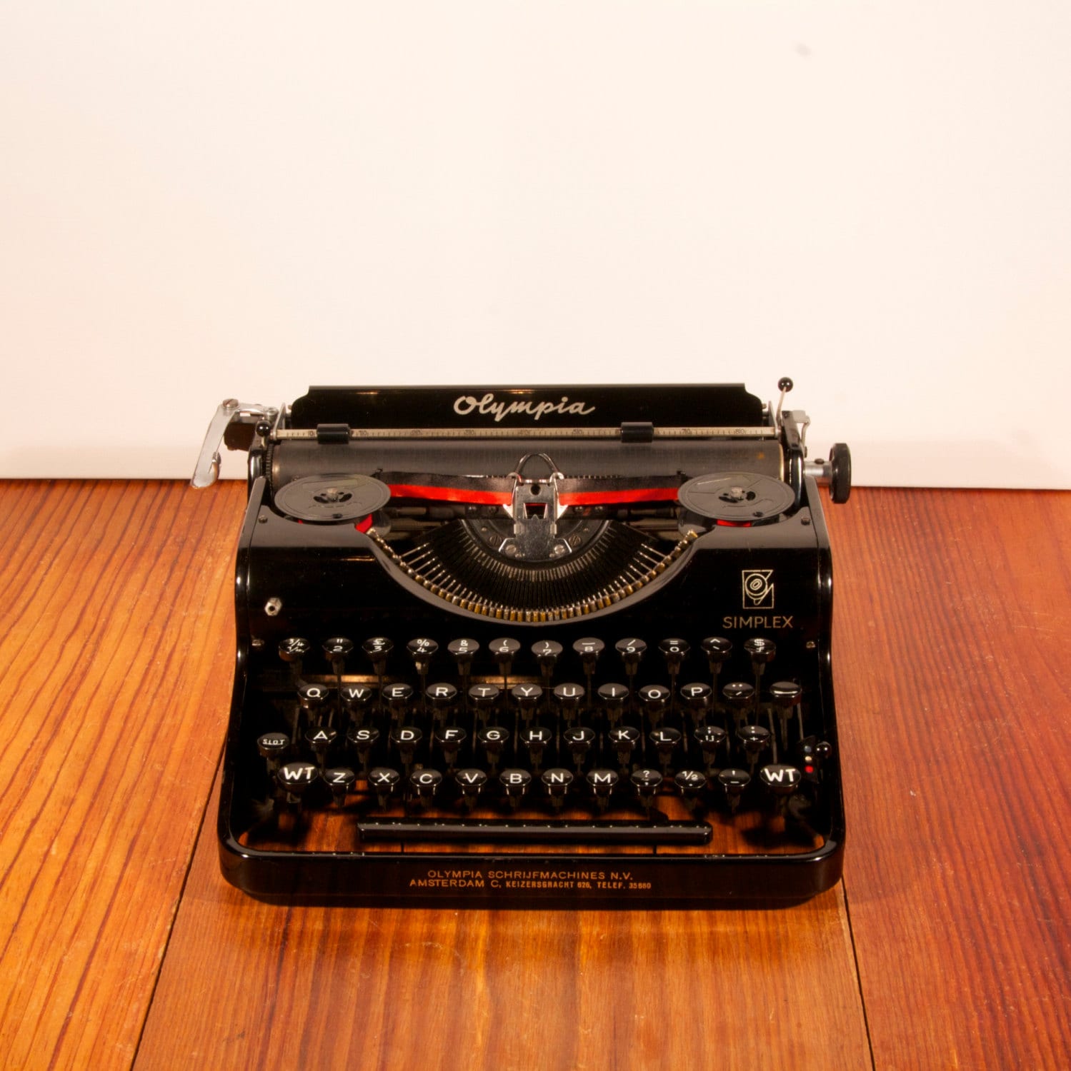 Olympia potable typewriter, antique with original case and key ...