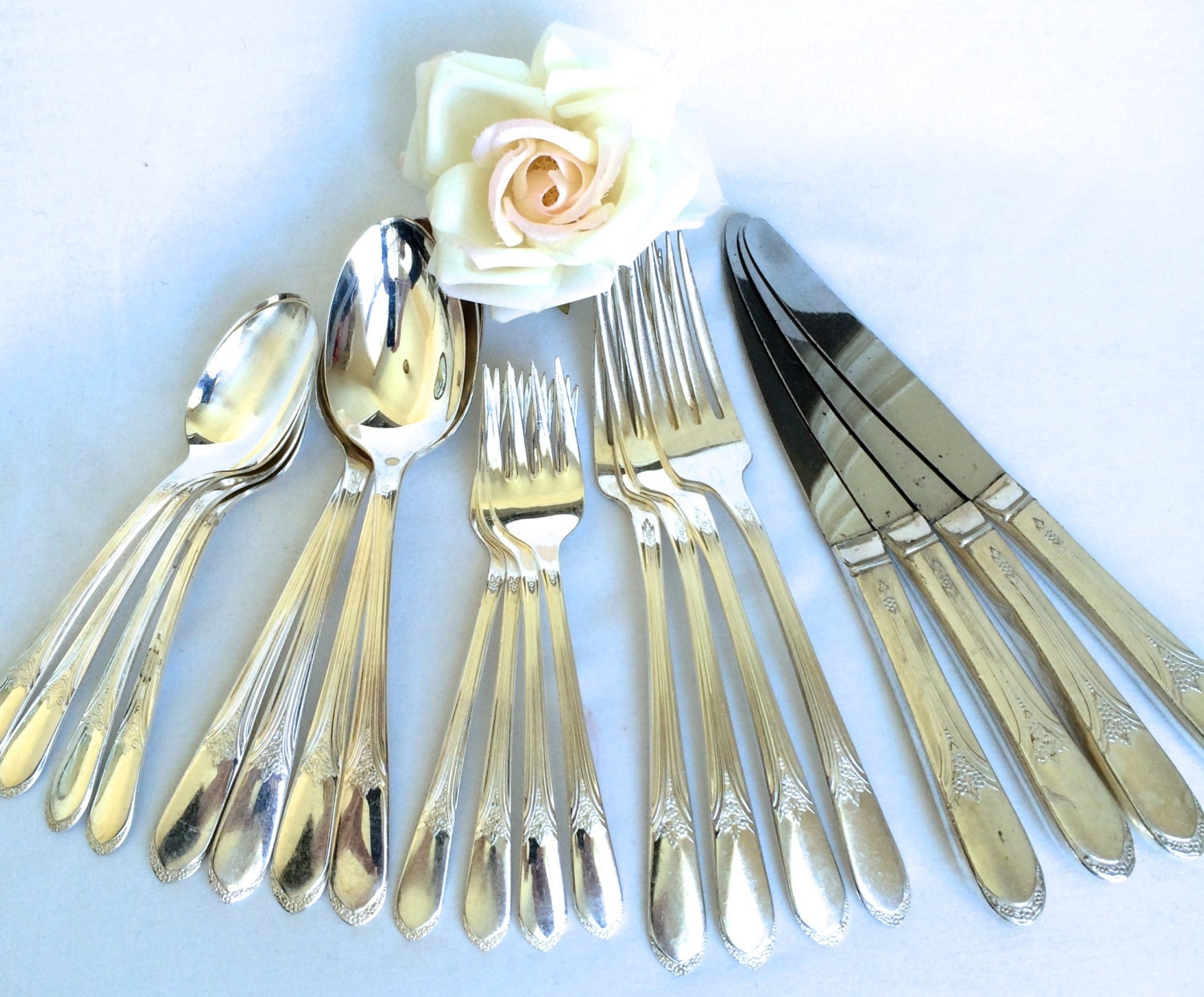 WM Rogers Silver Flatware place setting for 4 fluted floral