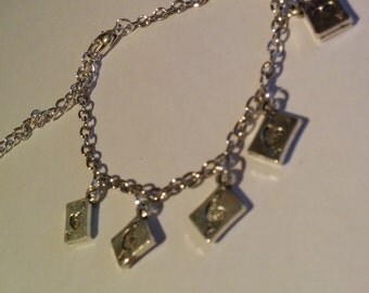 Ace of hearts playing card bracelet silver in colour