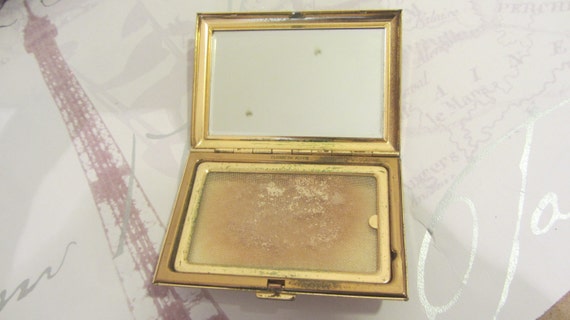 Elizabeth Arden gold metal compact-powder by Dazzerlingdoll