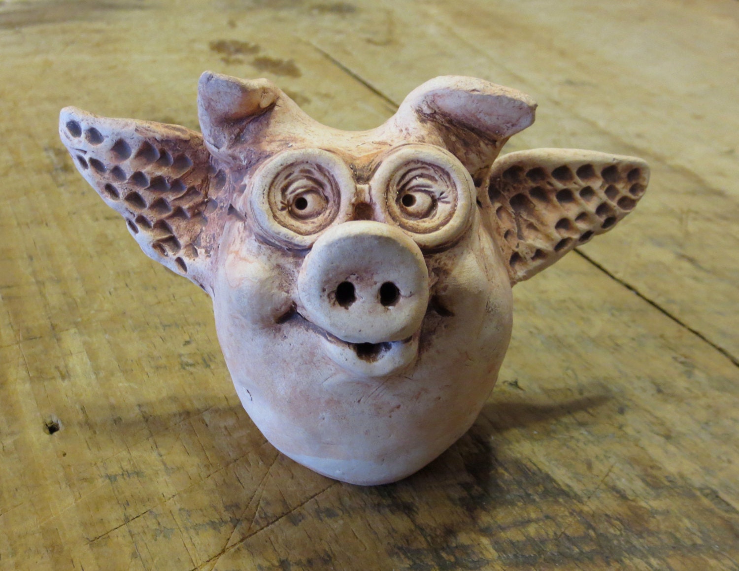 Flying Pig clay sculpture with goggles. 5 by NoonWhistlePottery