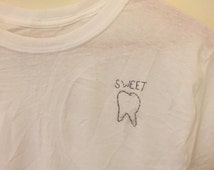 Popular items for tooth shirt on Etsy