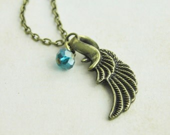 Wing charm necklace | Etsy
