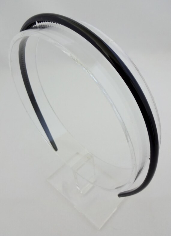 Thin black plastic rigid headbands set of six. One quarter