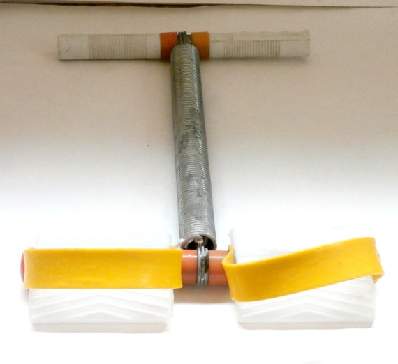 vintage 80s rowing manual exercise machine by PlasticPinkFlamingos