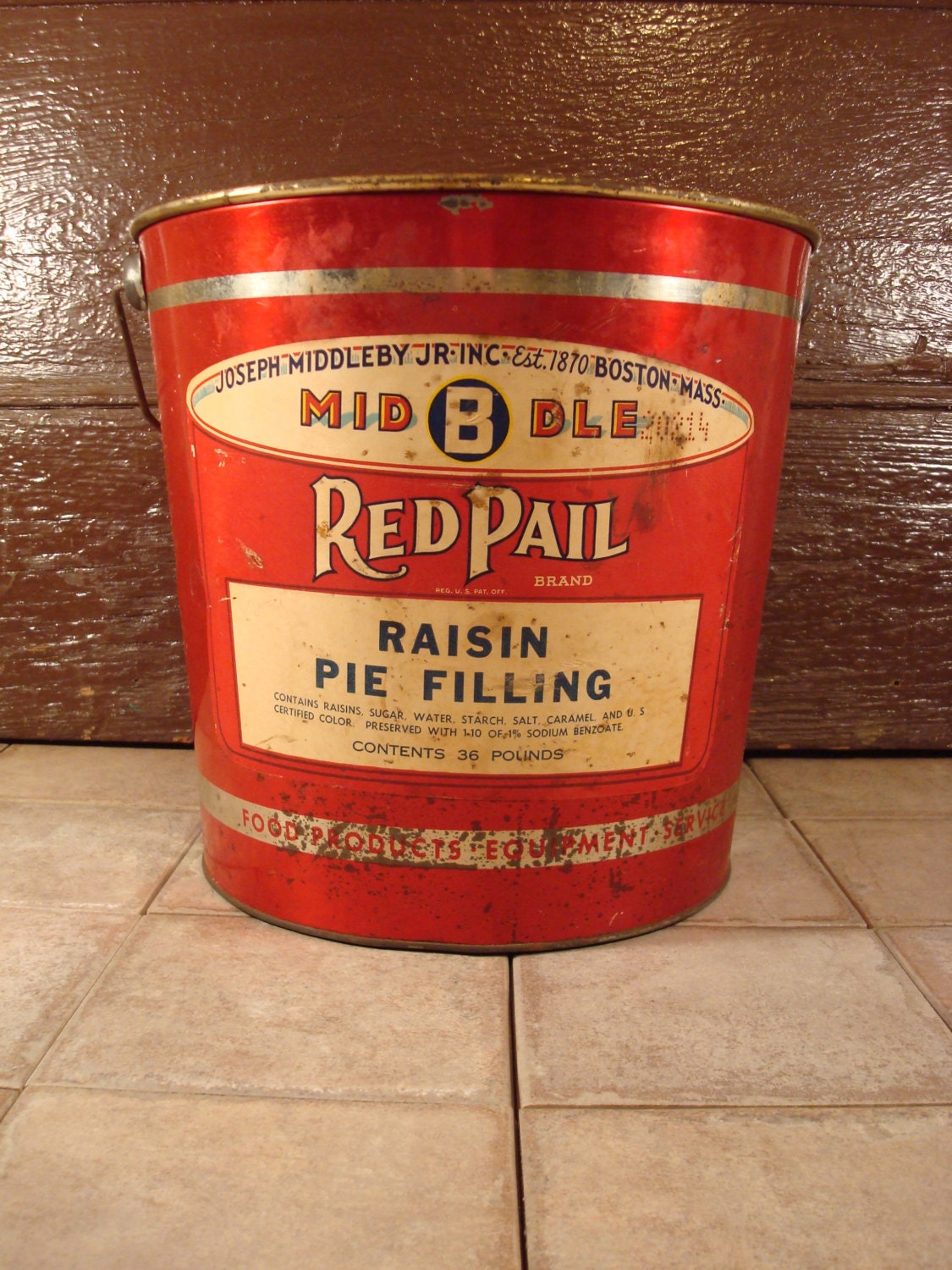 Large red vintage industrial advertising metal pail with a metal and ...
