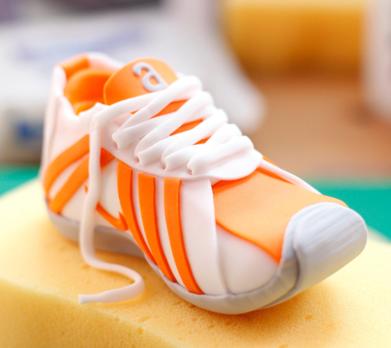 Running shoe cake topper completely edible. Handmade to