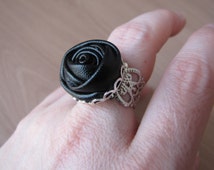 Popular items for black leather flower on Etsy
