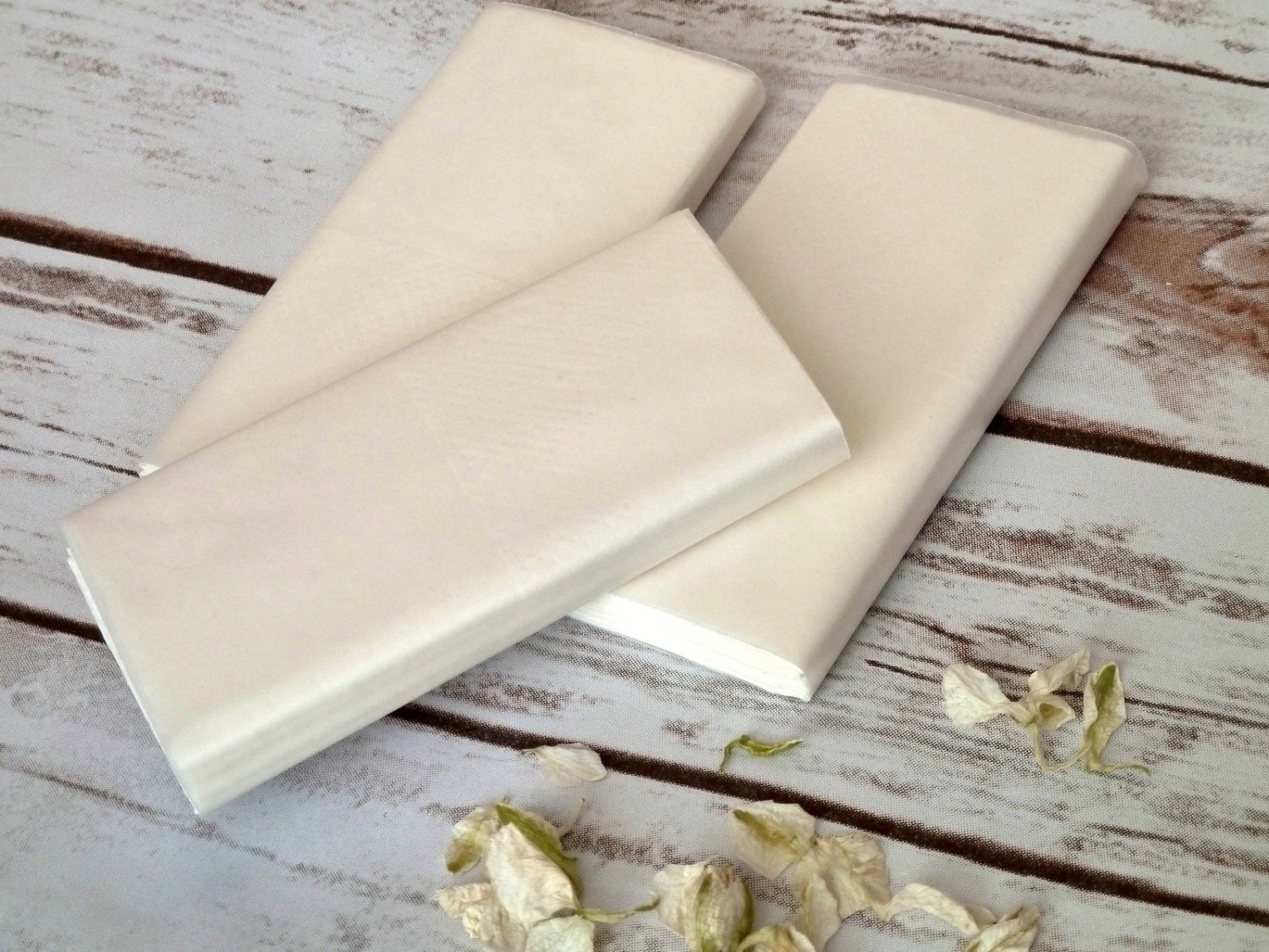 20 packs of plain pocket tissues.