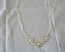 Popular items for silver gear necklace on Etsy