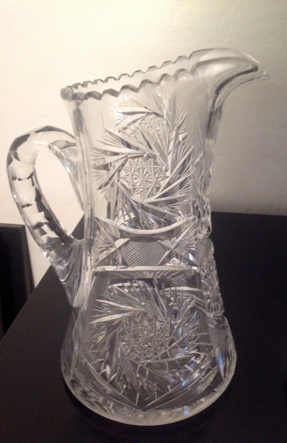 Crystal Pitcher with Sunburst Design.