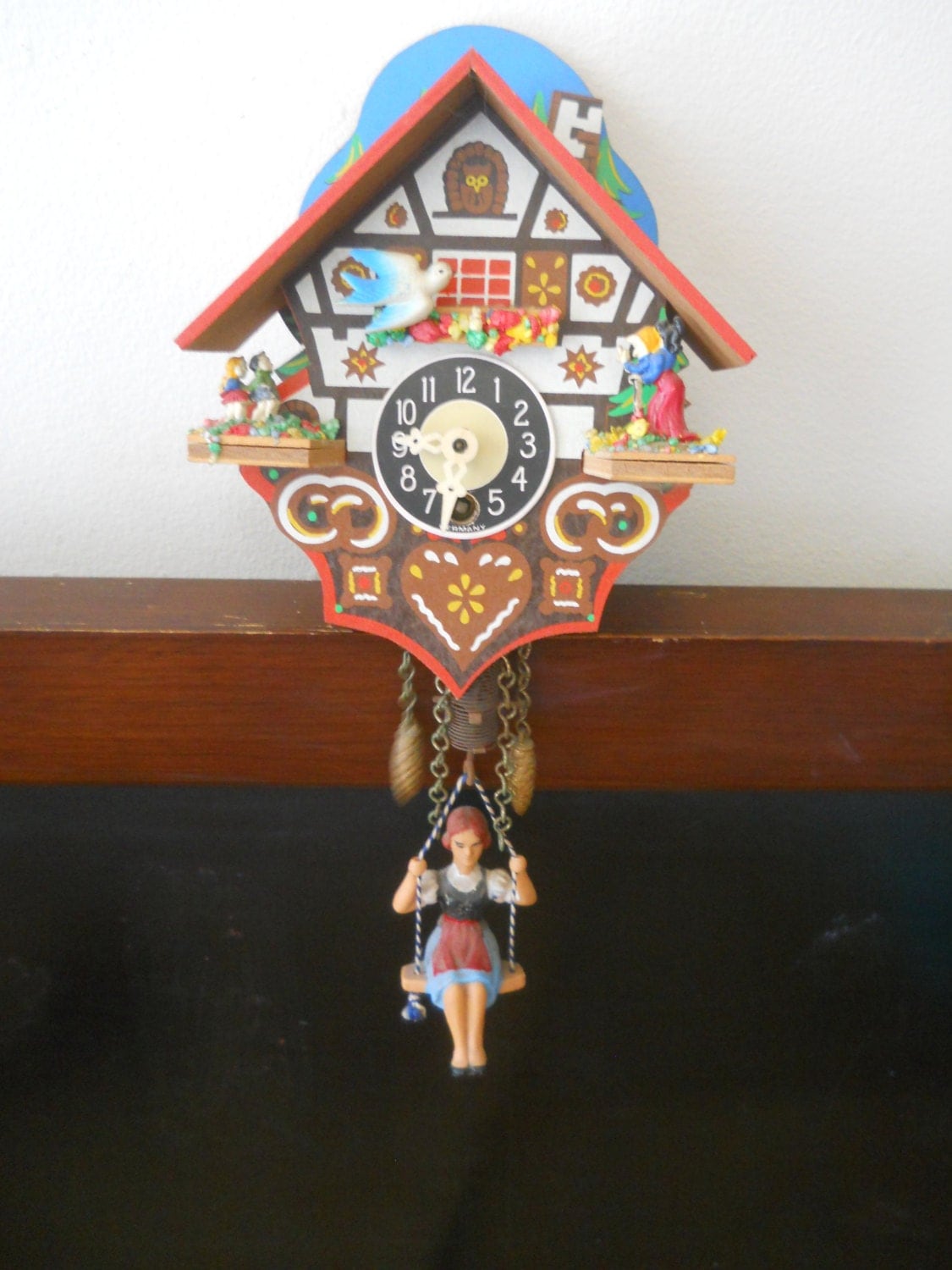 Vintage German Cuckoo Clock with Swinging Girl