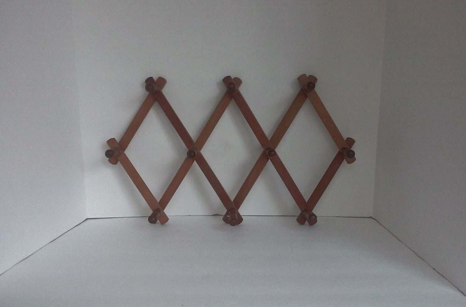 Dark Brown Wooden Peg Accordion Hanging Rack – Haute Juice