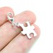 Jigsaw Puzzle Piece Charm. Puzzle Piece Charm. Silver Puzzle