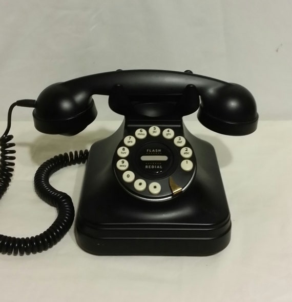 Items similar to Black 1980's midcentury styled telephone, with white push buttons. on Etsy