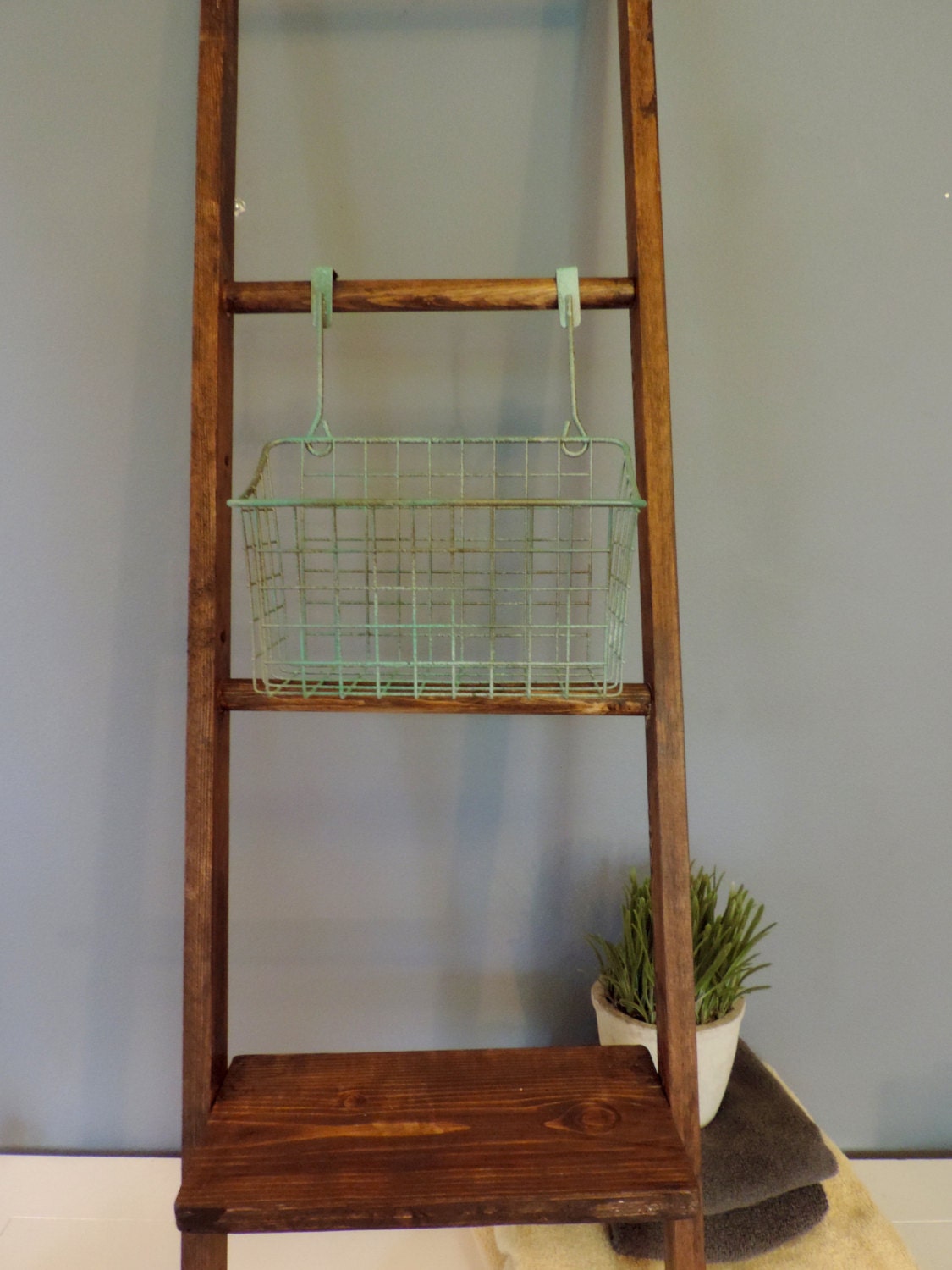 Rustic wooden ladder storage