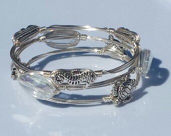 Items similar to Set of 3 -Stackable Wire Wrapped Bangle Bracelets on Etsy