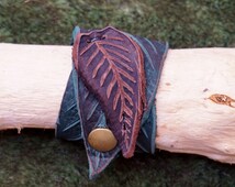 Popular items for leather wrist cuff on Etsy