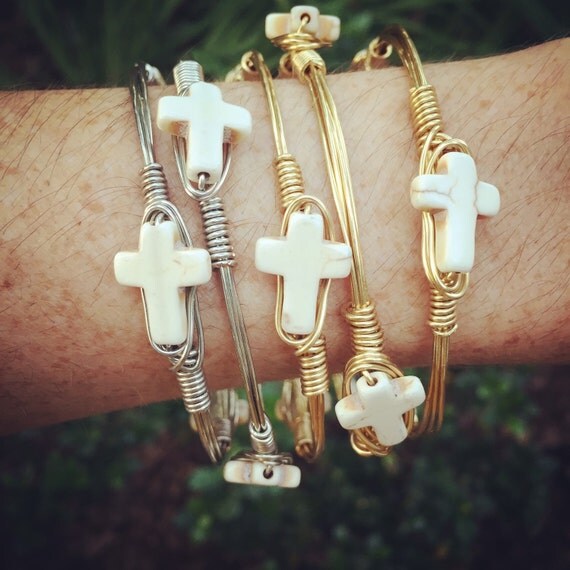 Items similar to Handmade wire wrapped ivory cross bangle bracelet on Etsy