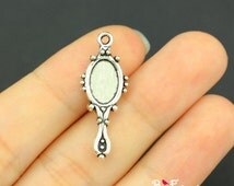 Popular items for mirror charm on Etsy