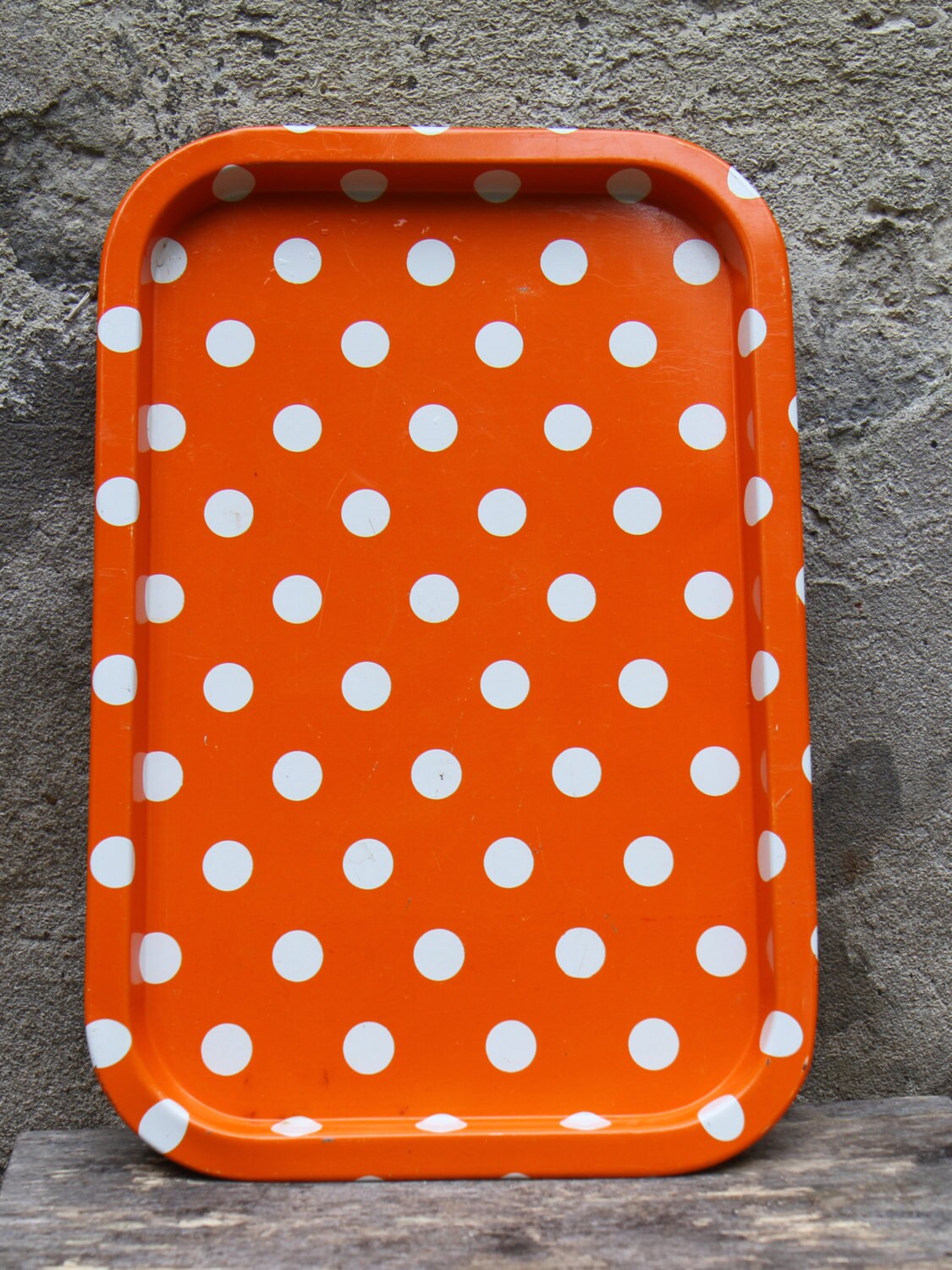 Orange metal tray with large white dots. ultra vitamin – Haute Juice