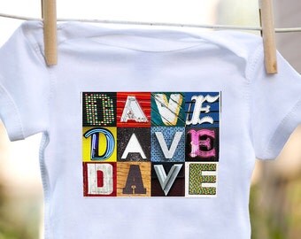 Personalized baby bodysuit featuring the name by SignYourNames