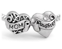 Popular items for mom to be charm on Etsy