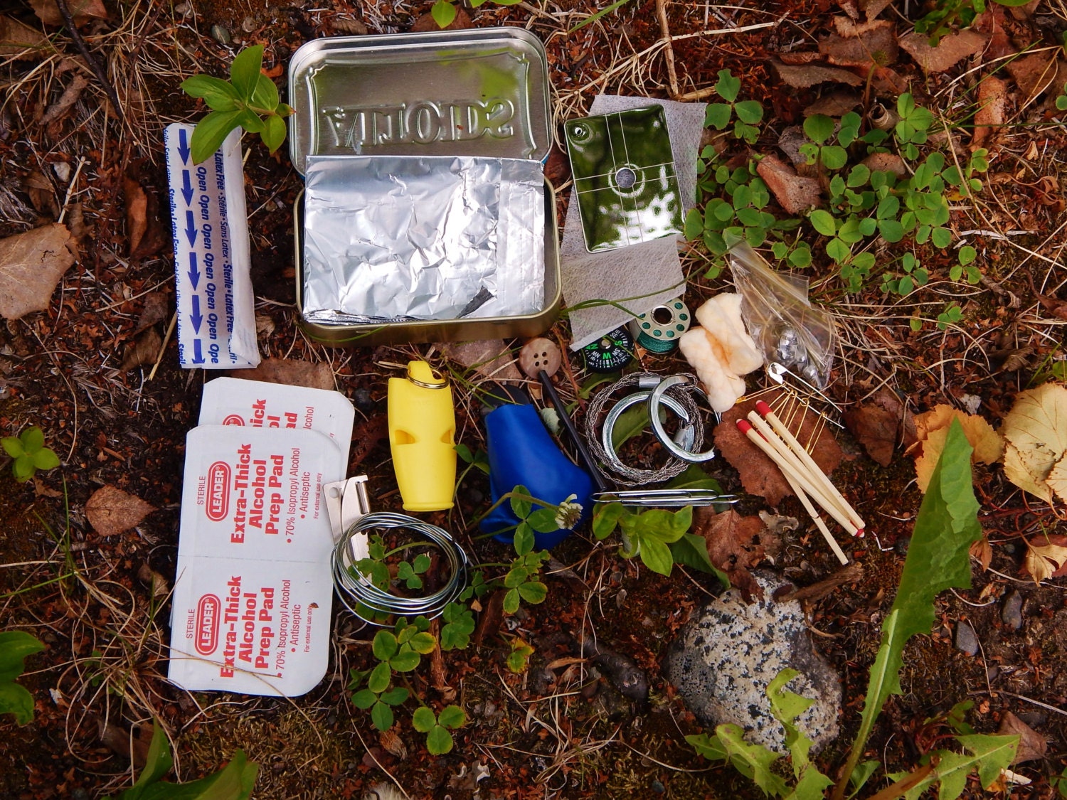 Altoid tin mini survival kit with wire saw by Denneycustomknives