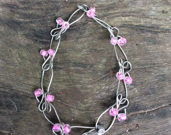 Wire wrapped skull ring by WiredwithaTwist on Etsy