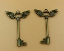 Popular items for key with wings on Etsy