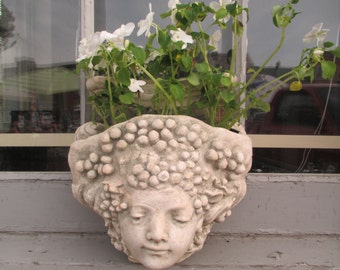 4 Faces planter by ConcreteDesignStudio on Etsy