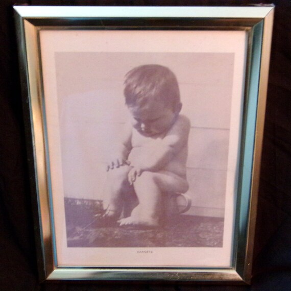 Efforts Print of little child on Pot This is a Framed Vintage