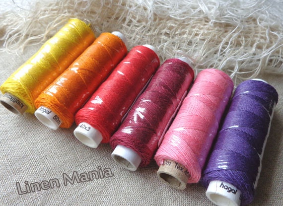 Six spools of linen thread nearly rainbow colourway sewing