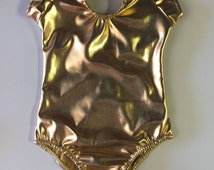 Popular items for gold bodysuit on Etsy