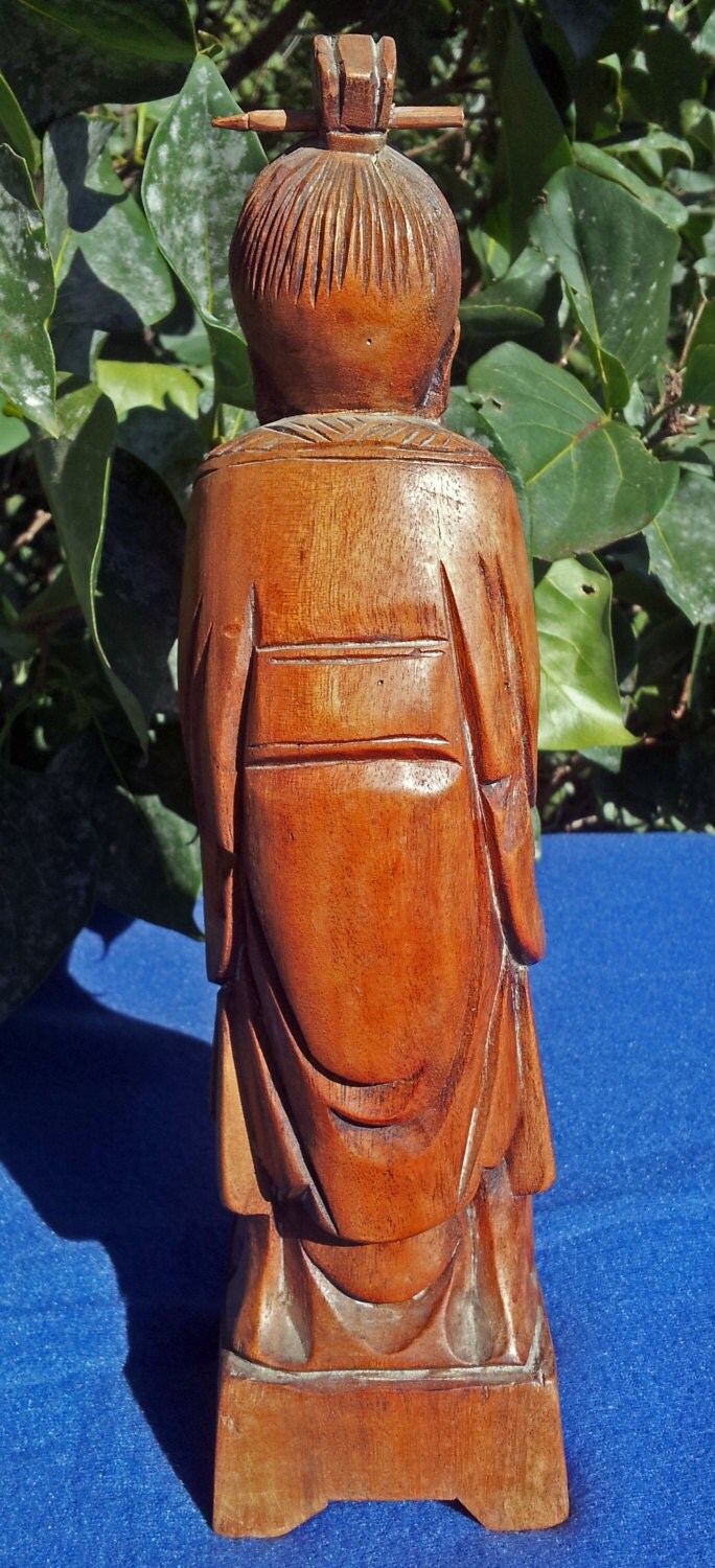 Vintage hand carved wood statue of Confucius from the Vintage hand carved wood statue of Confucius from the