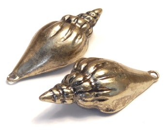 Metal sea shells | Etsy